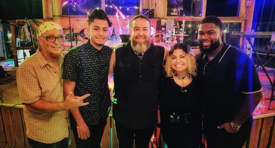 Flora: Top Hits Band Saturday Night Live, Nauti Parrot Oasis, Fort ...